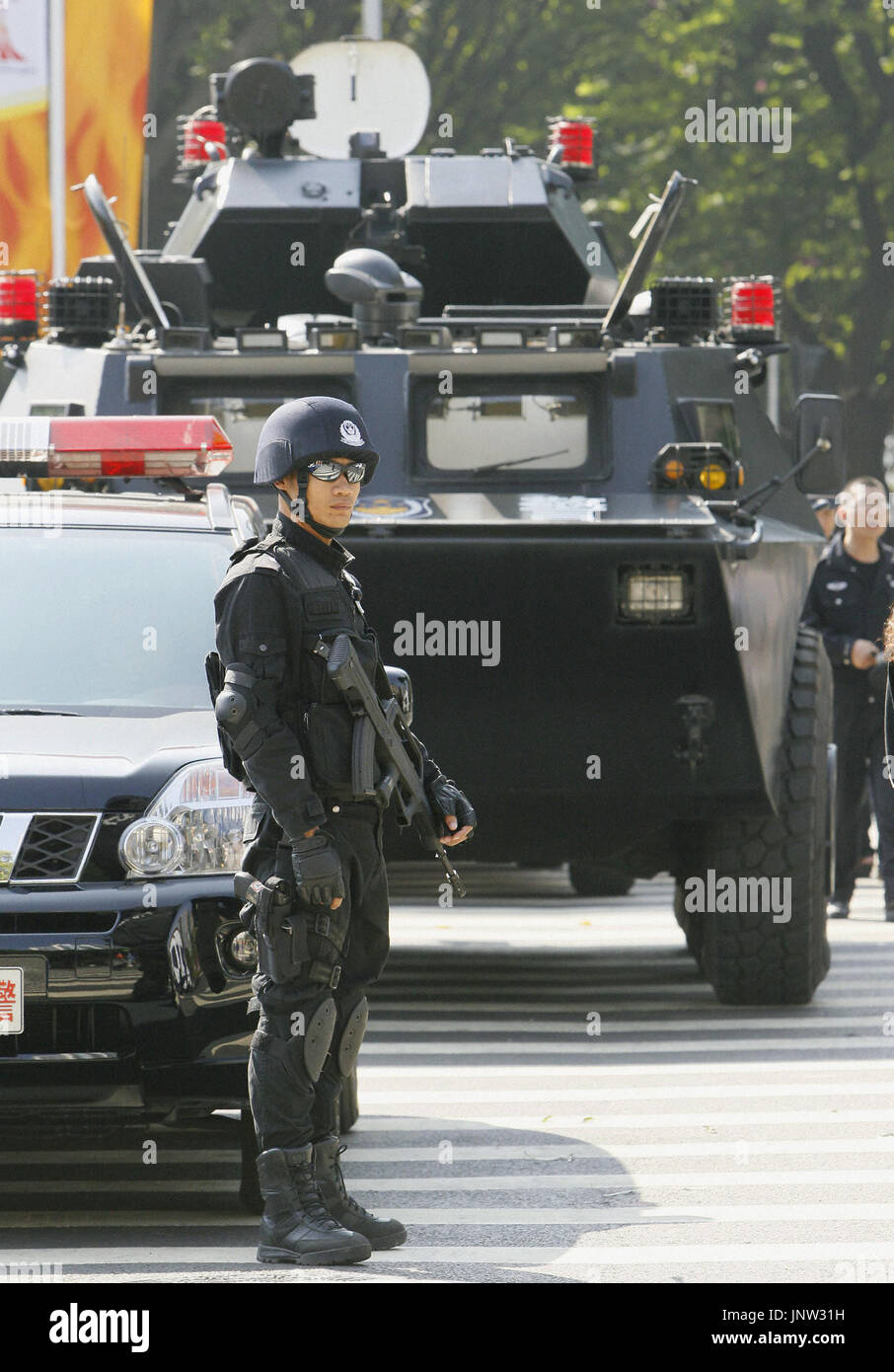 GUANGZHOU, China - Chinese police mobilize an armored vehicle near ...