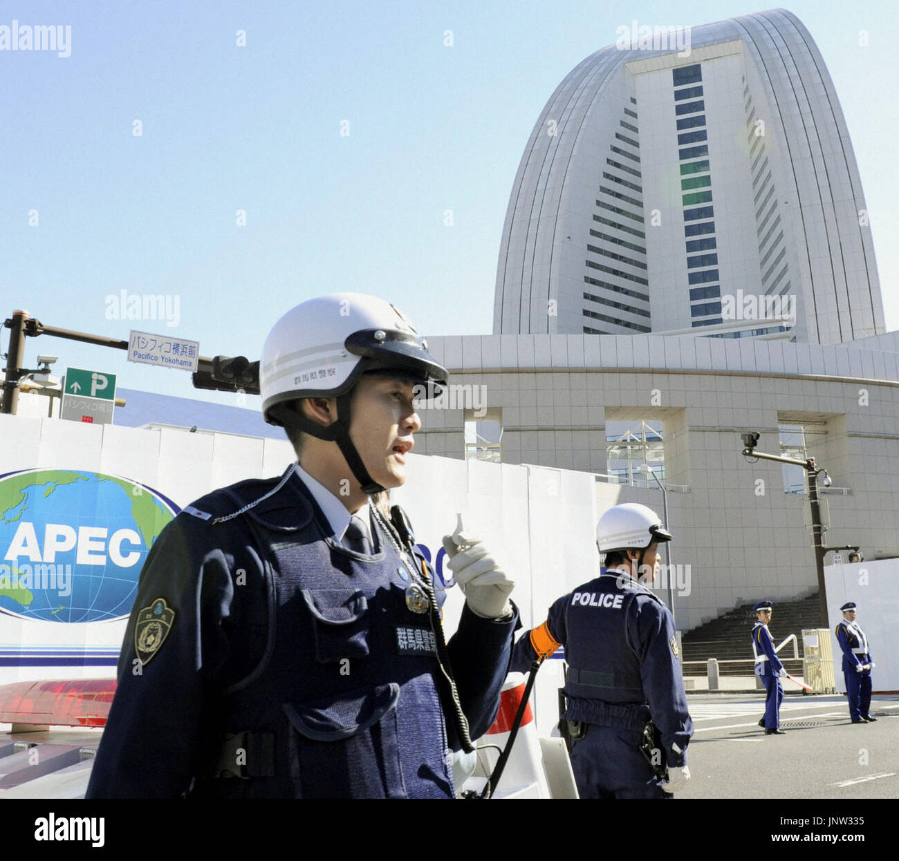 YOKOHAMA, Japan - Police officers patrol the area around Pacifico ...