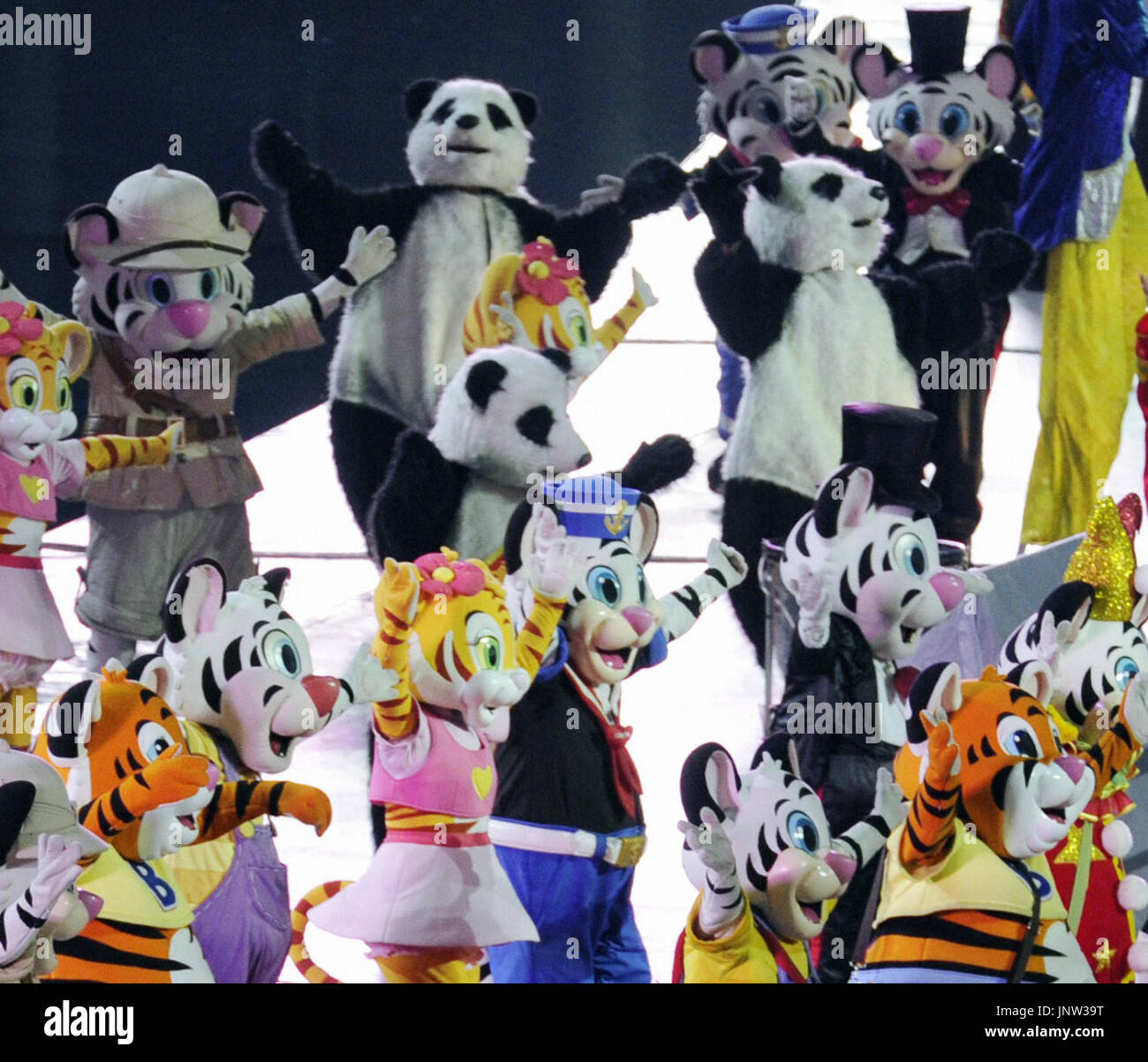 GUANGZHOU, China - Performers wearing panda and tiger costumes dance ...