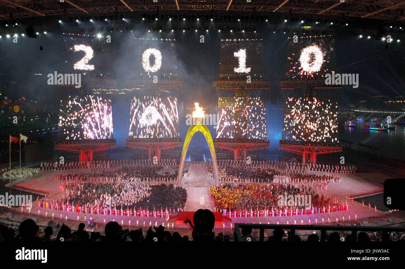 GUANGZHOU, China - The flame of the Asian Games is lit during the ...