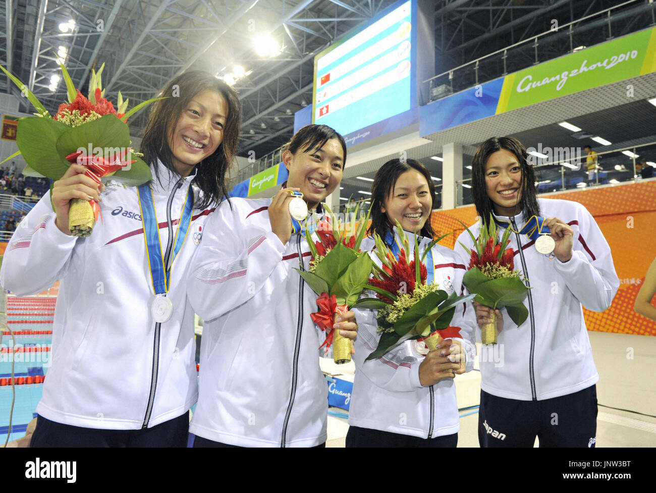 GUANGZHOU, China - Members of the Japanese 400-meter medley relay team ...
