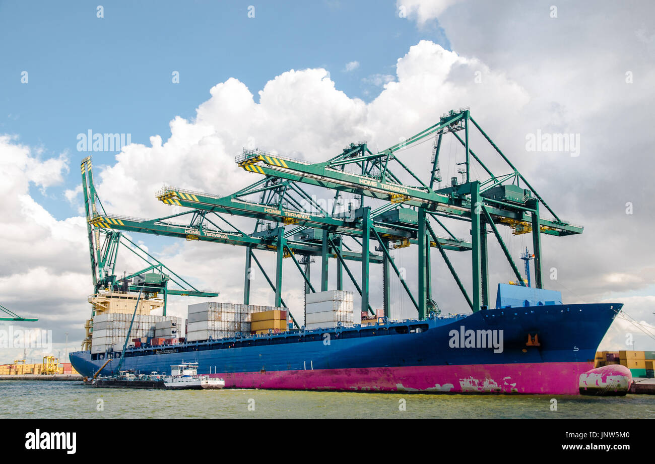 View on cargo ship in the port of Antwerp Stock Photo - Alamy