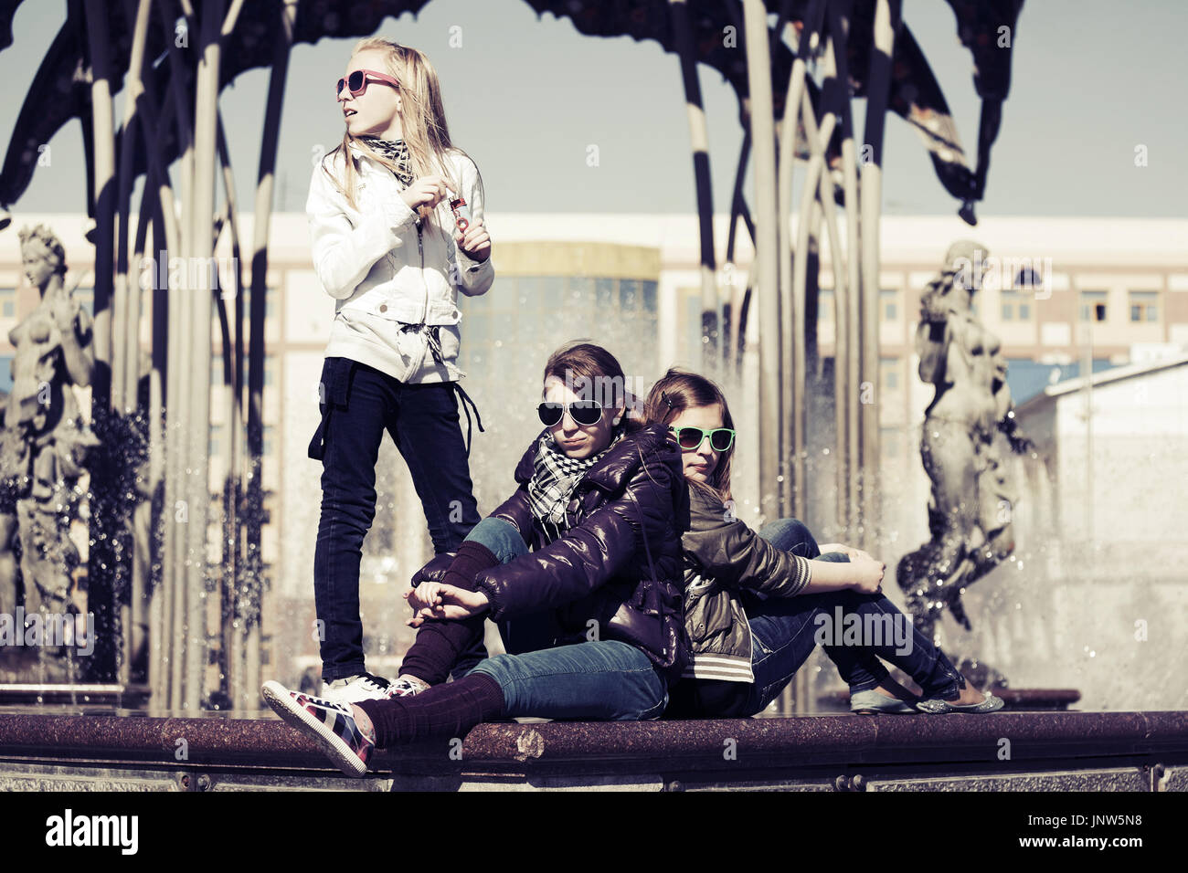 Group of teen girls on a city street Stock Photo - Alamy