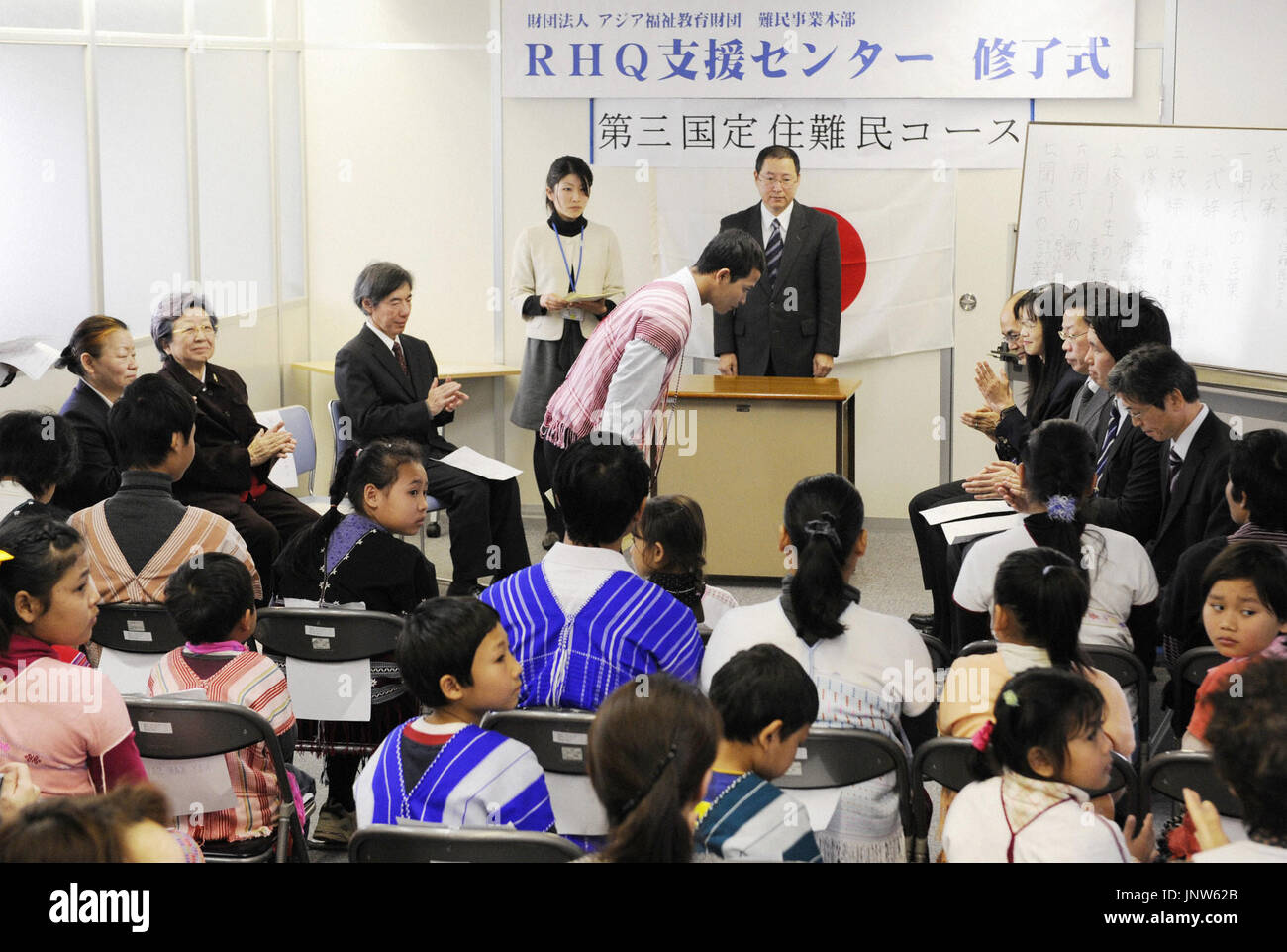 TOKYO, Japan - Refugees from Myanmar attend a completion ceremony in ...