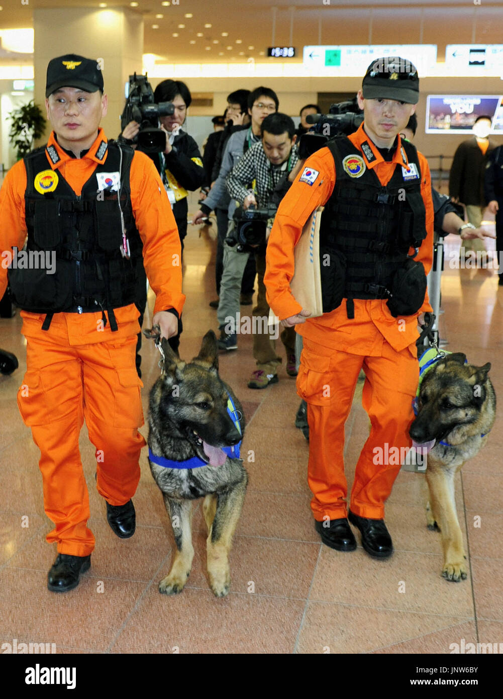 TOKYO, Japan - Rescue workers from South Korea arrive at Haneda airport ...