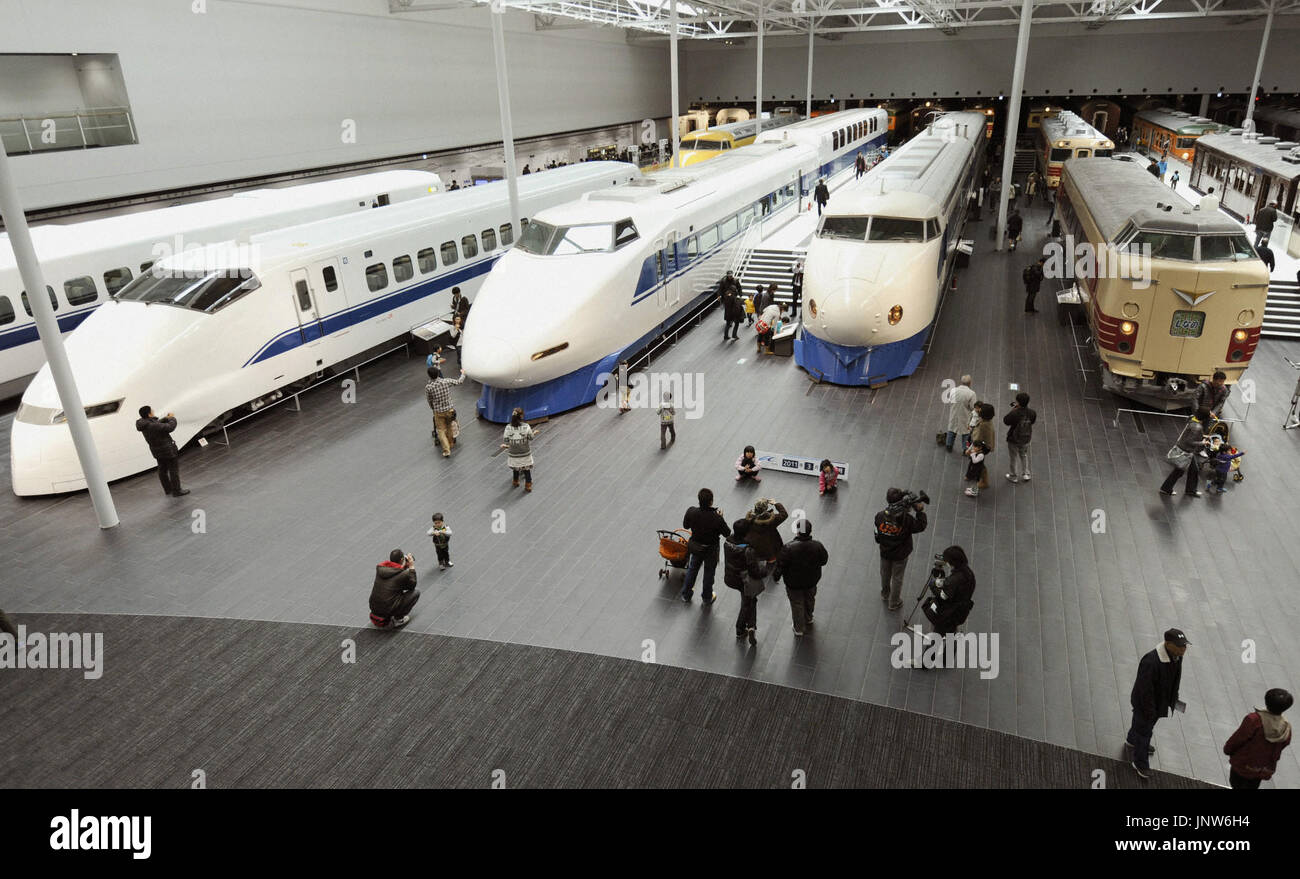 NAGOYA, Japan - Visitors view historic Japanese trains displayed in ...