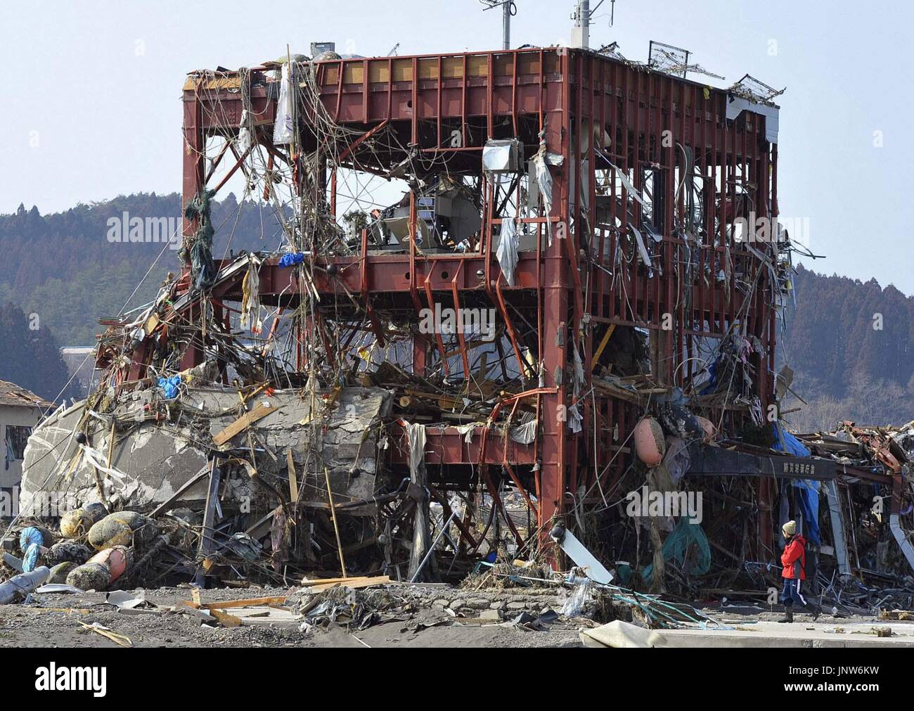 MINAMISANRIKU, Japan - Photo shows a severely damaged building of a ...