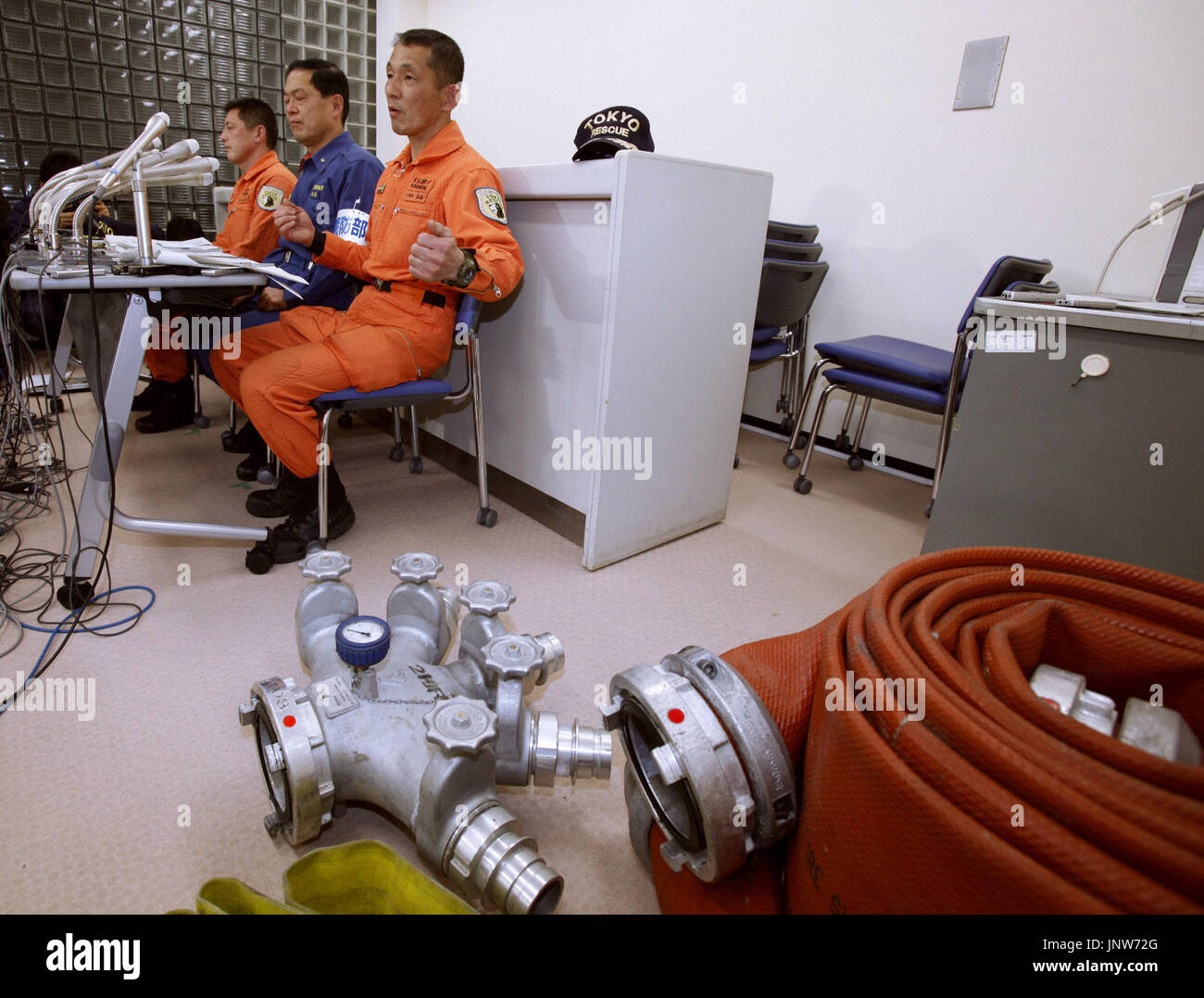 TOKYO, Japan - Tokyo Fire Department rescue squad chiefs (from L to R ...