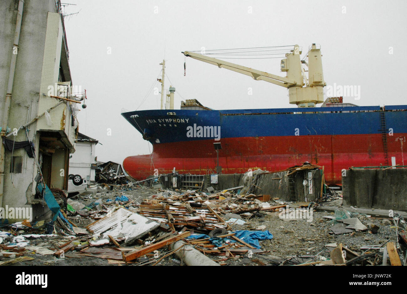 KAMAISHI, Japan - A large stranded vessel blocks a road in Kamaishi ...