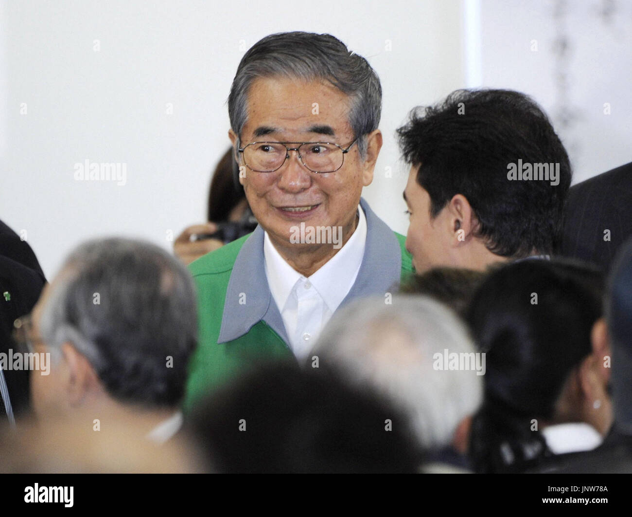 TOKYO, Japan - Incumbent Tokyo Gov. Shintaro Ishihara speaks with his ...