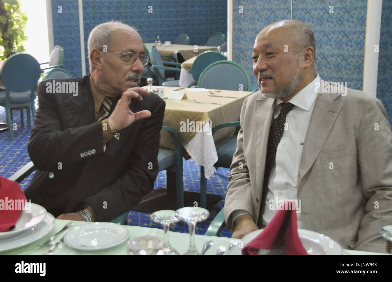 BENGHAZI, Libya - Tsukasa Uemura (R), deputy director general of the ...
