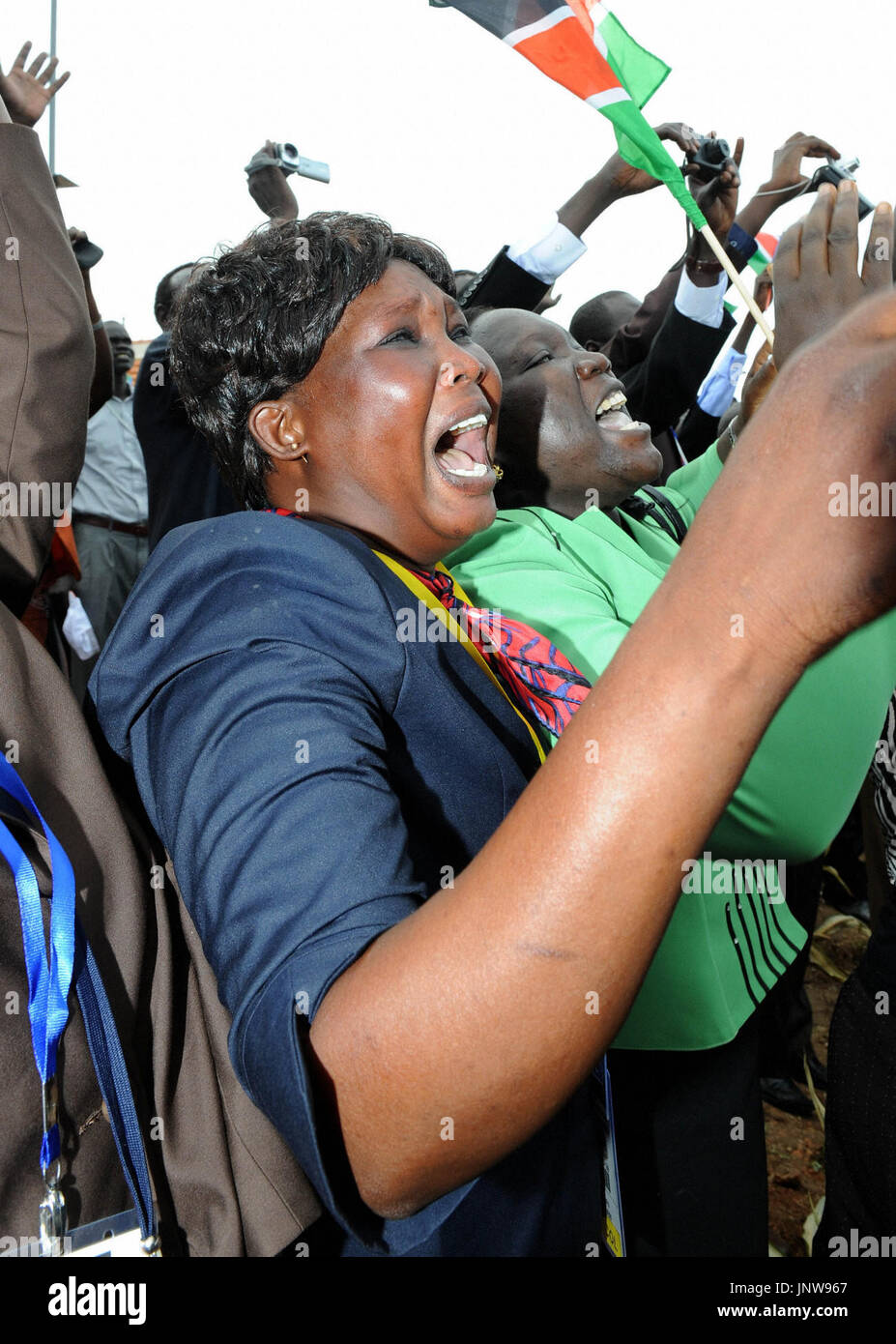 TOKYO, Japan - Women express their joy during the independence ceremony ...