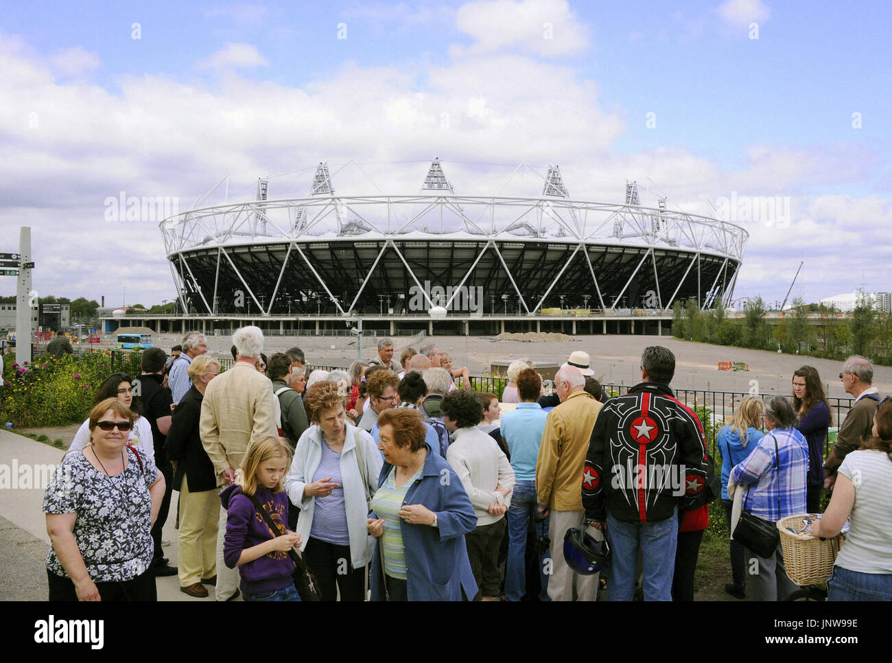 LONDON, Britain - Many tourists visit a hill to view the Olympic ...