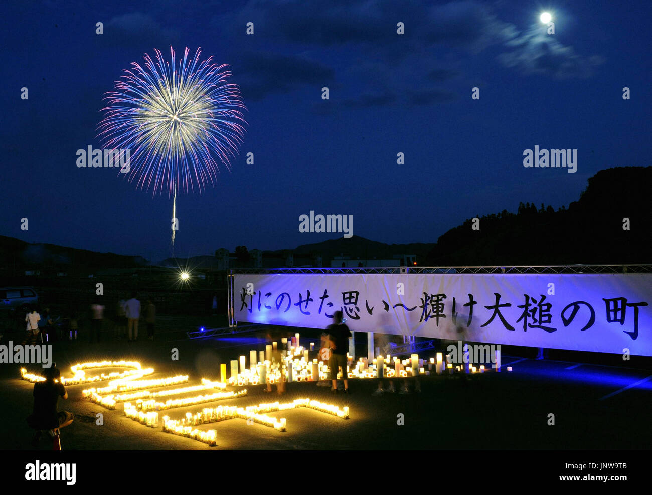 OTSUCHI, Japan - Candles are lined up in hope for the recovery of areas ...