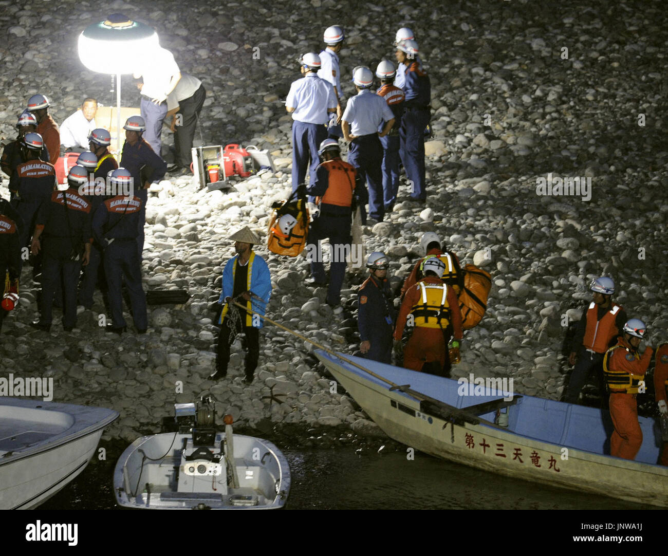 HAMAMATSU, Japan - Personnel search for missing people and accident ...