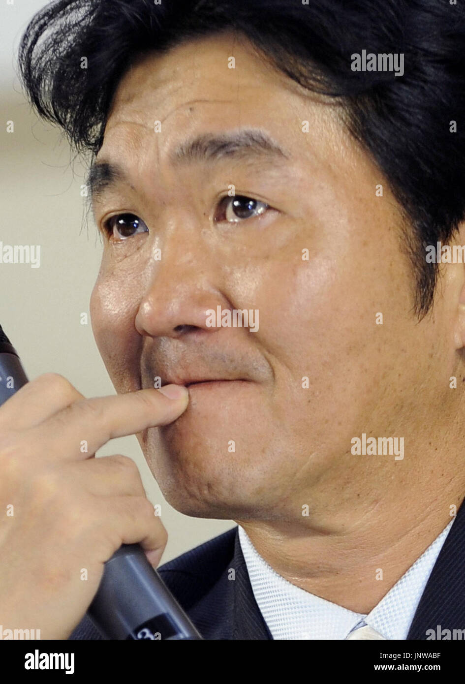 TOKYO, Japan - Japanese TV personality Shinsuke Shimada appears teary ...
