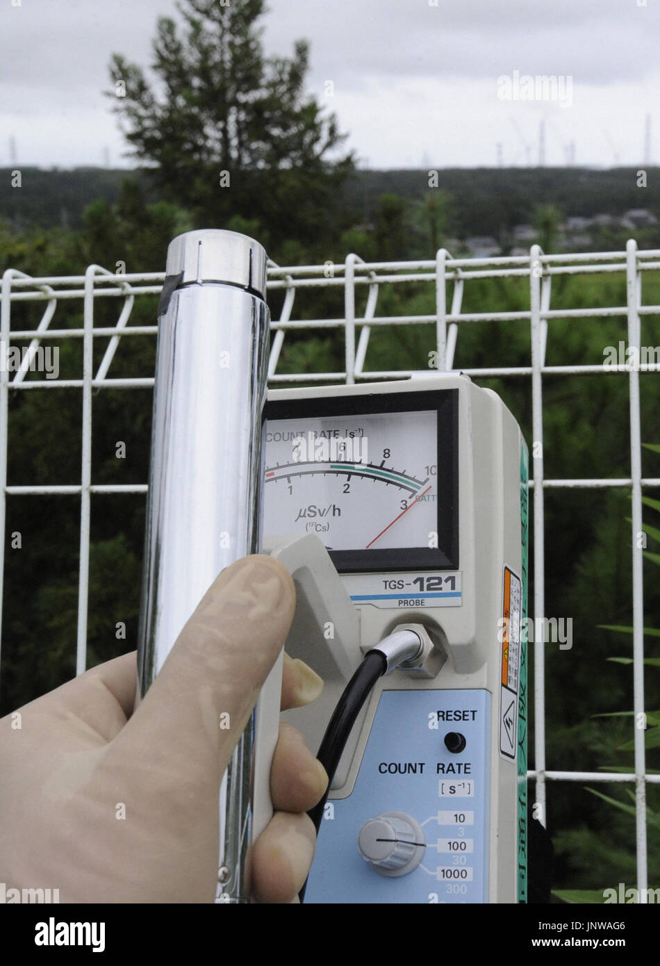 HIRONO, Japan - A dosimeter shows over 30 microsieverts per hour of ...