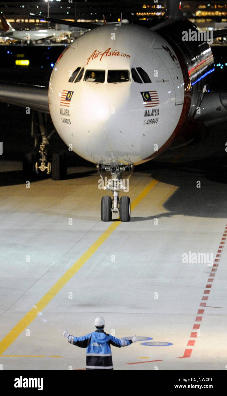 TOKYO, Japan - The first flight of low-cost Malaysian carrier AirAsia X ...