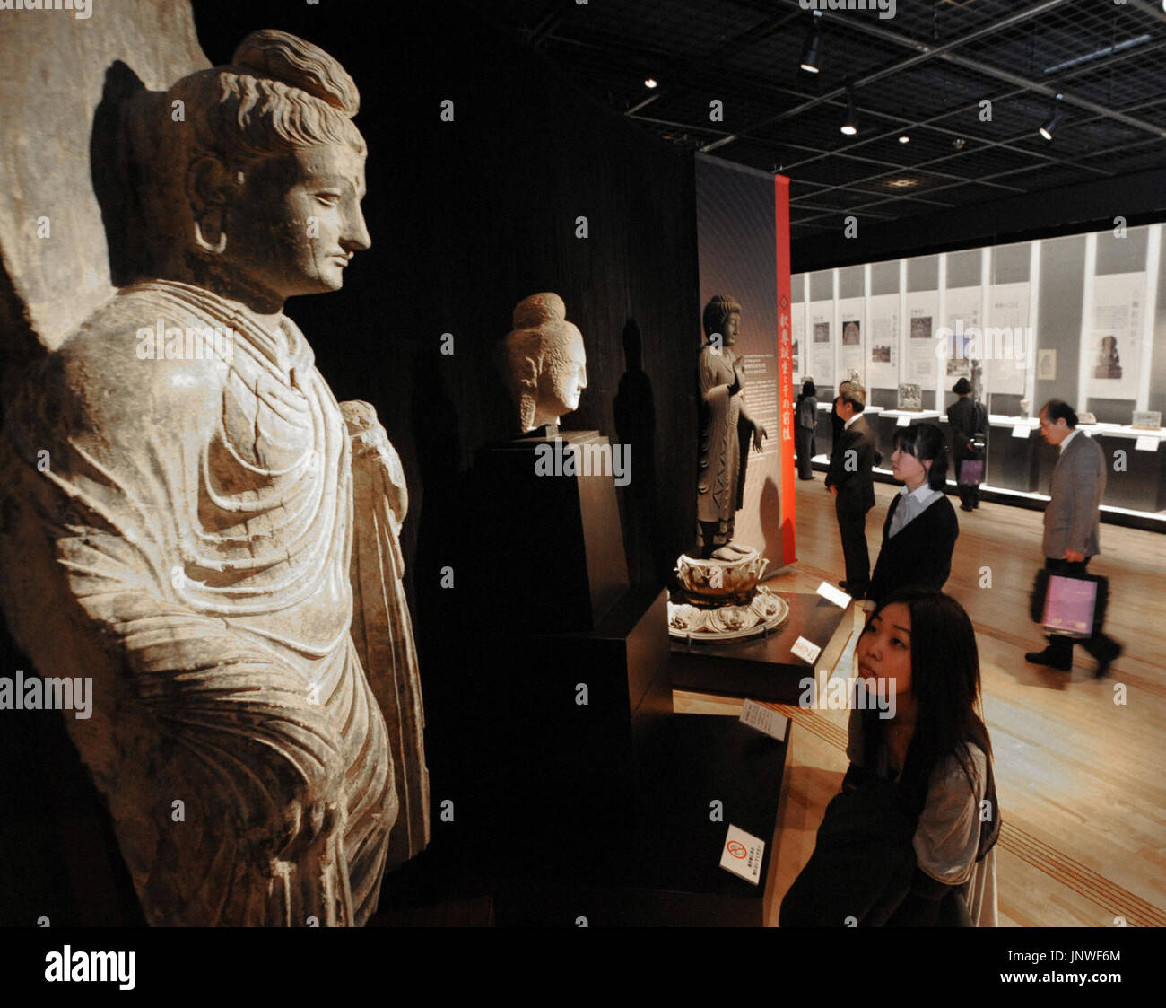 KYOTO, Japan - Invited guests view exhibited artifacts at Ryukoku ...