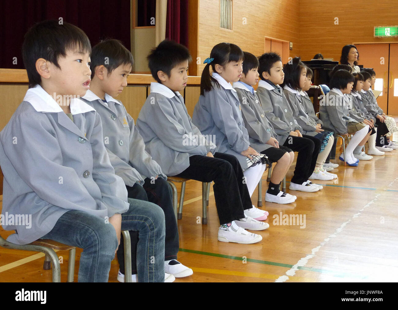FUKUSHIMA, Japan - New first graders attend the enrollment ceremony at ...