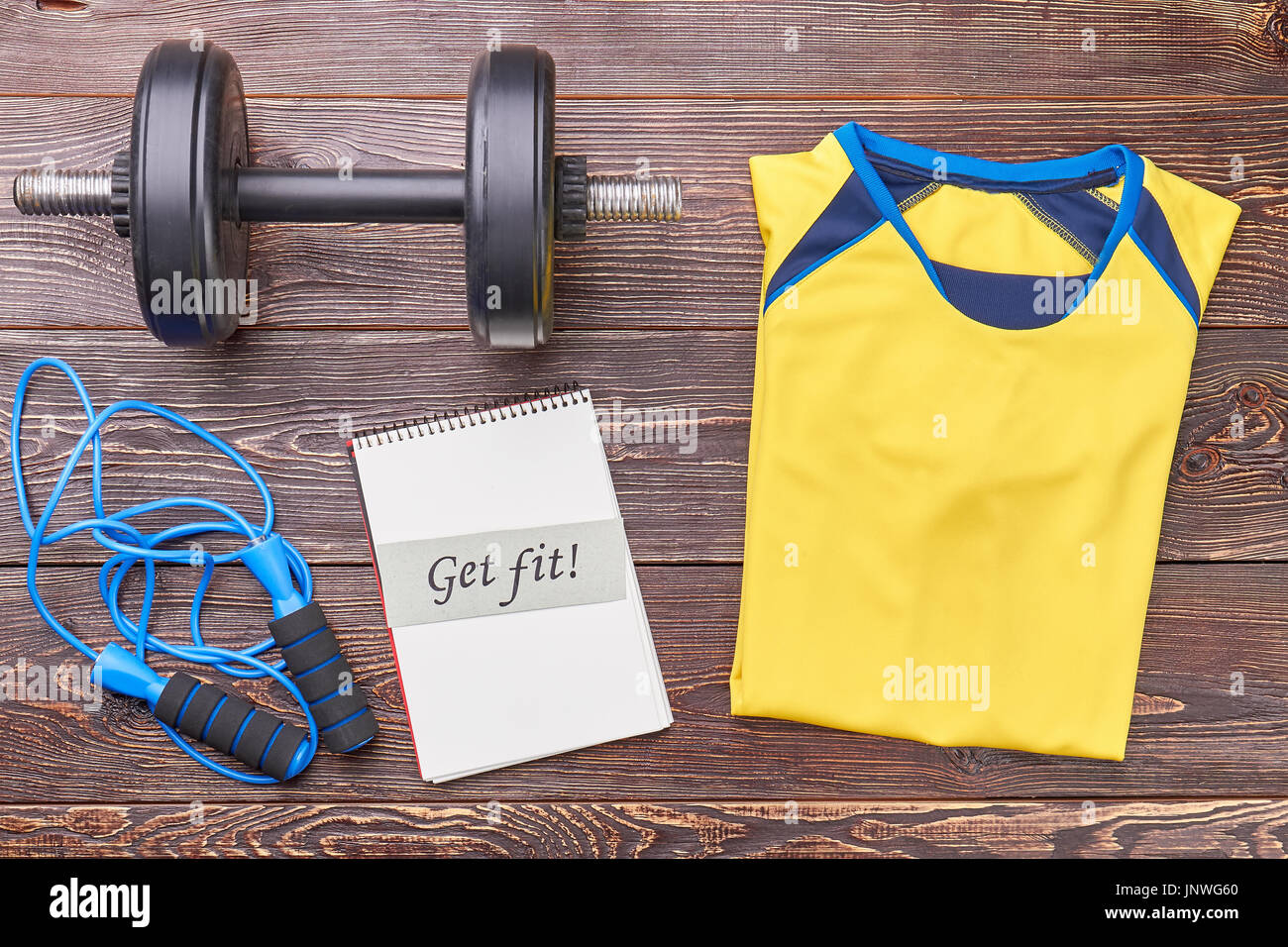 Fitness items, vintage wooden floor Stock Photo - Alamy
