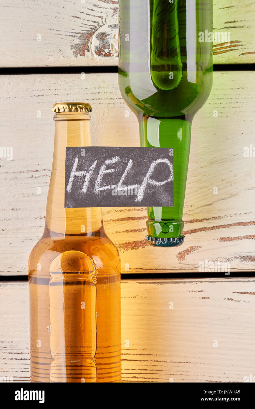 Text help, two full bottles Stock Photo - Alamy