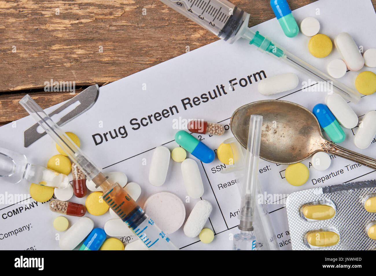 Drug screen result form, syringes, pills Stock Photo - Alamy