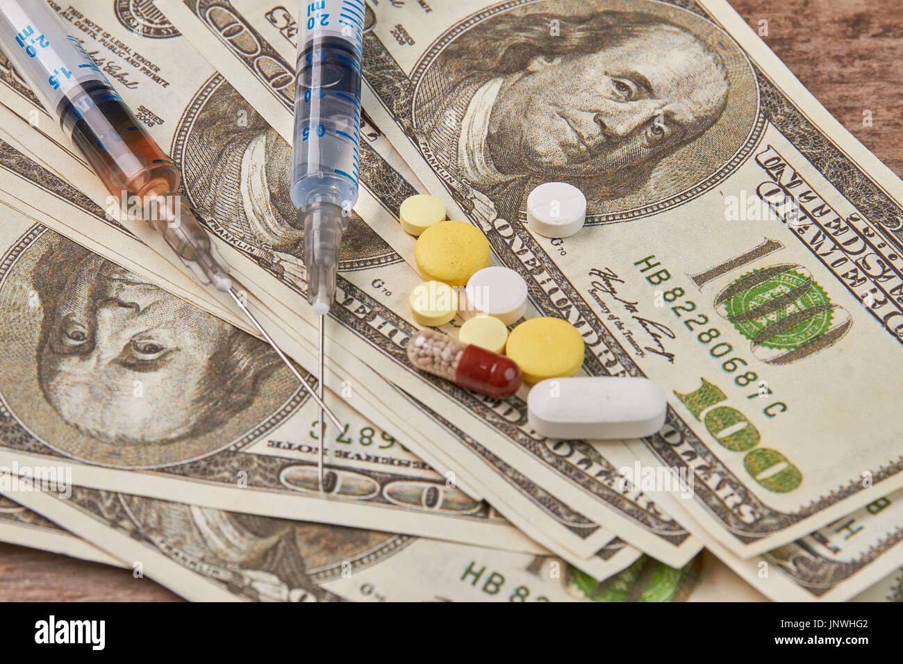 Money injection hi-res stock photography and images - Alamy