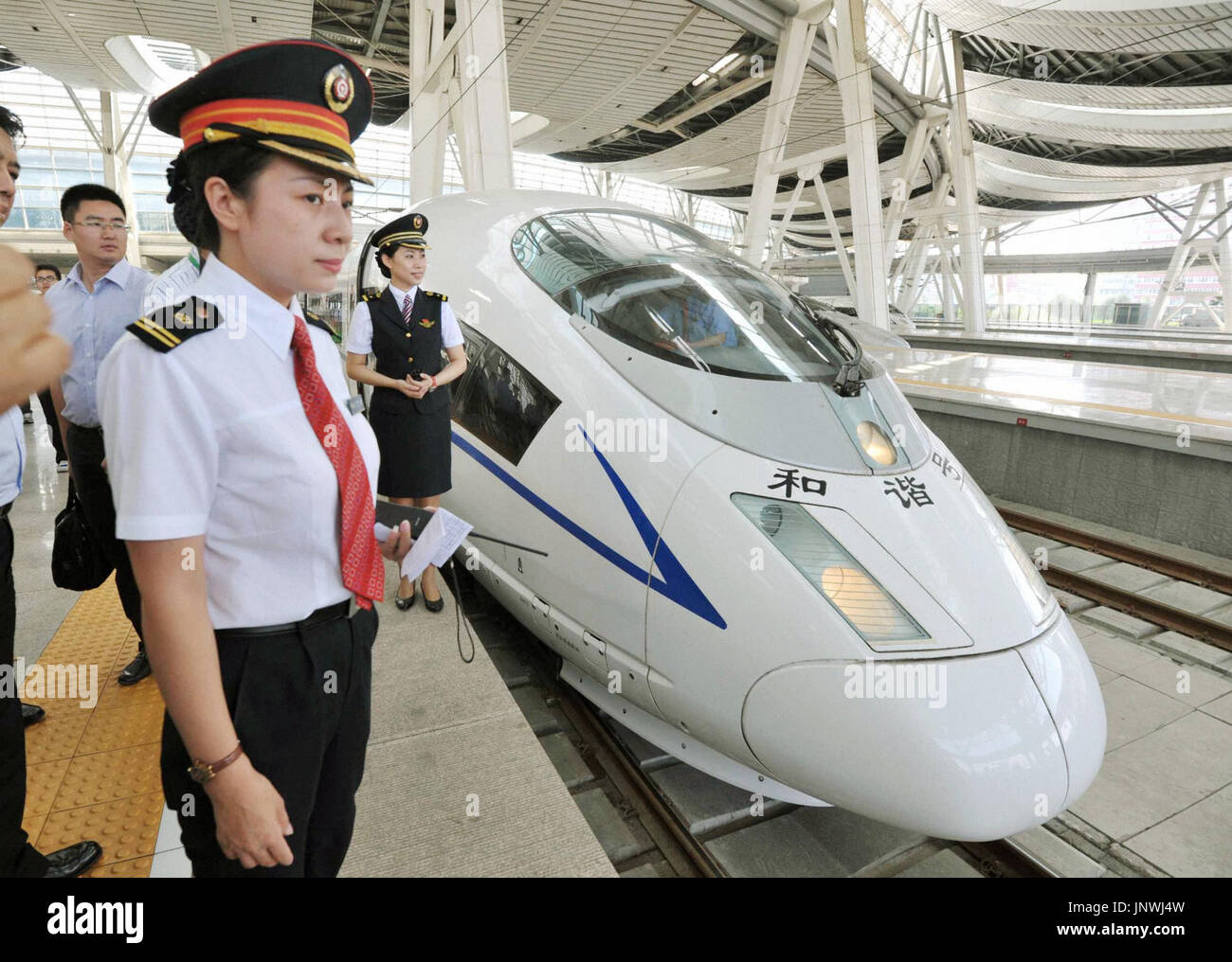 BEIJING, China - A bullet train is shown to reporters at a station in ...