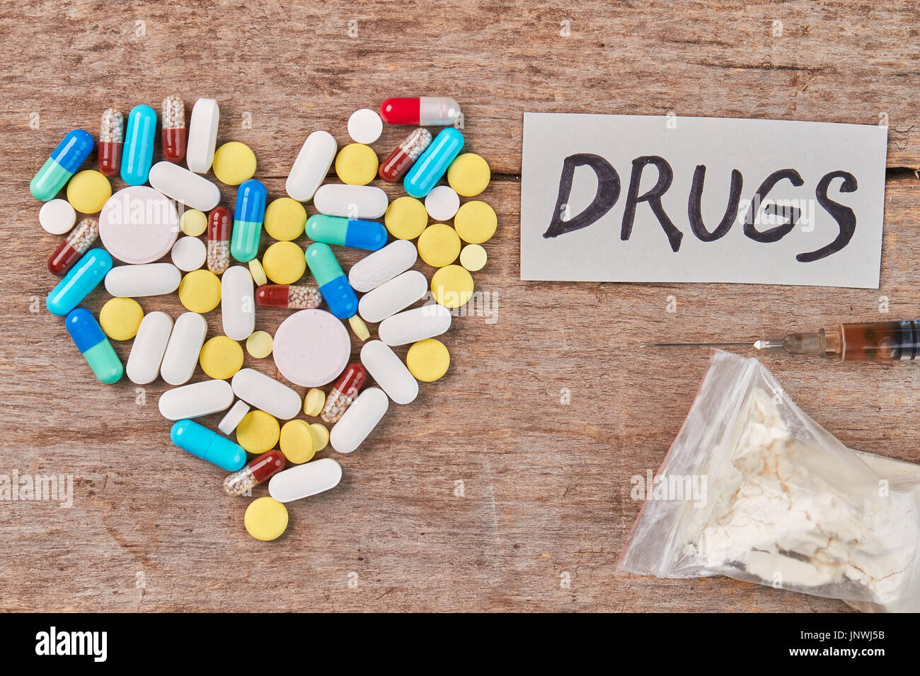 Drugs, heart, paper message Stock Photo - Alamy