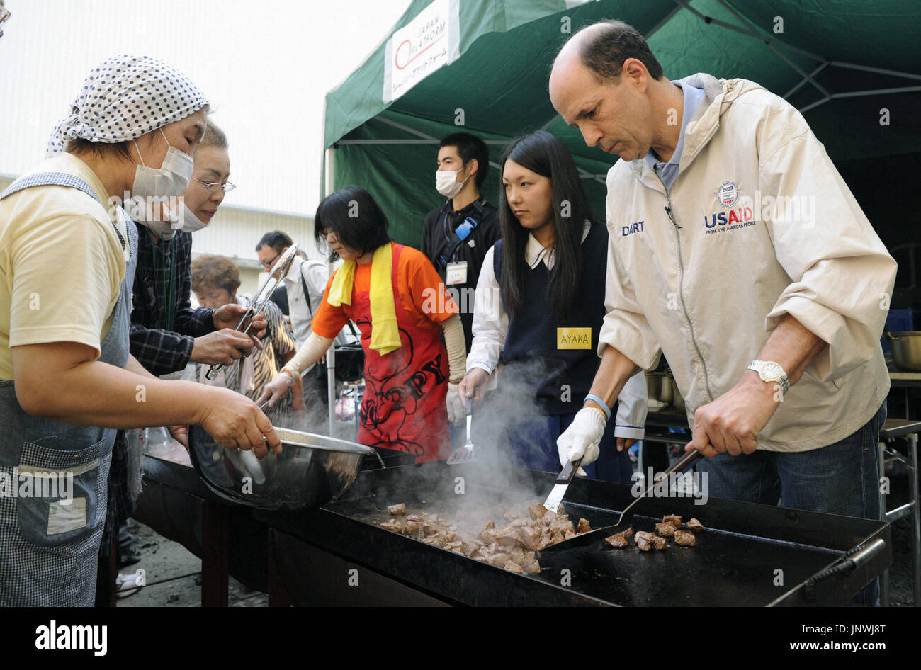 OTSUCHI, Japan - U.S. Ambassador to Japan John Roos (R) takes part in a ...