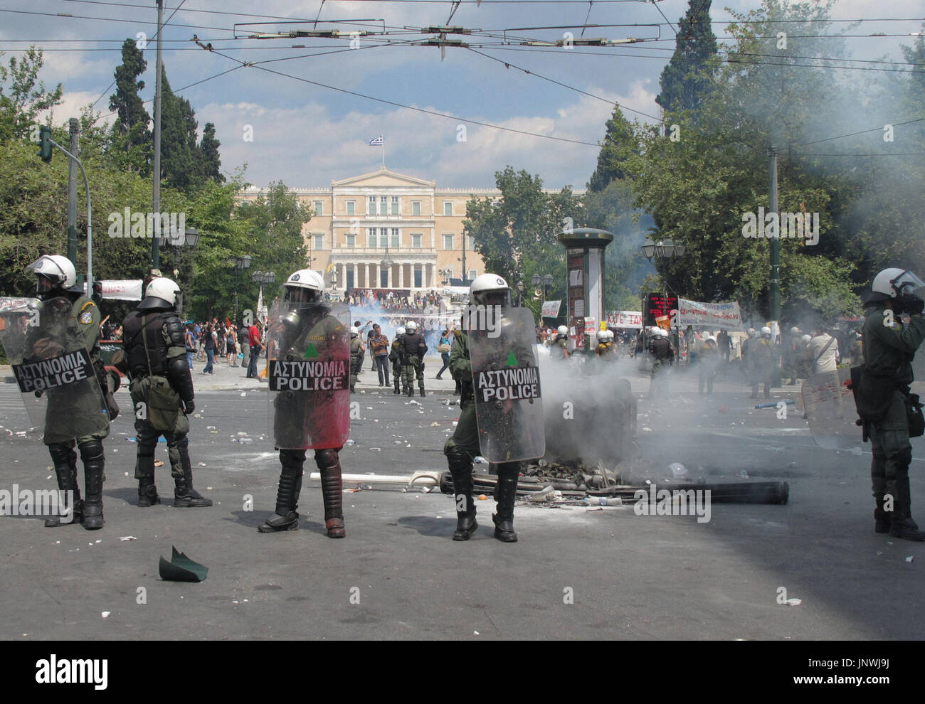ATHENS, Greek - Police officers guard an area near the Greek parliament ...