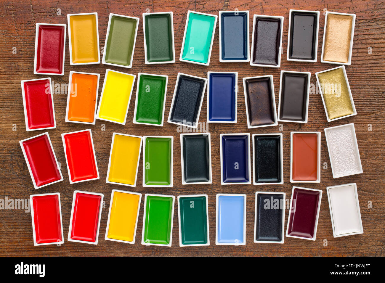 traditional Japanese watercolors - a set of 36 paints on a grunge wood ...