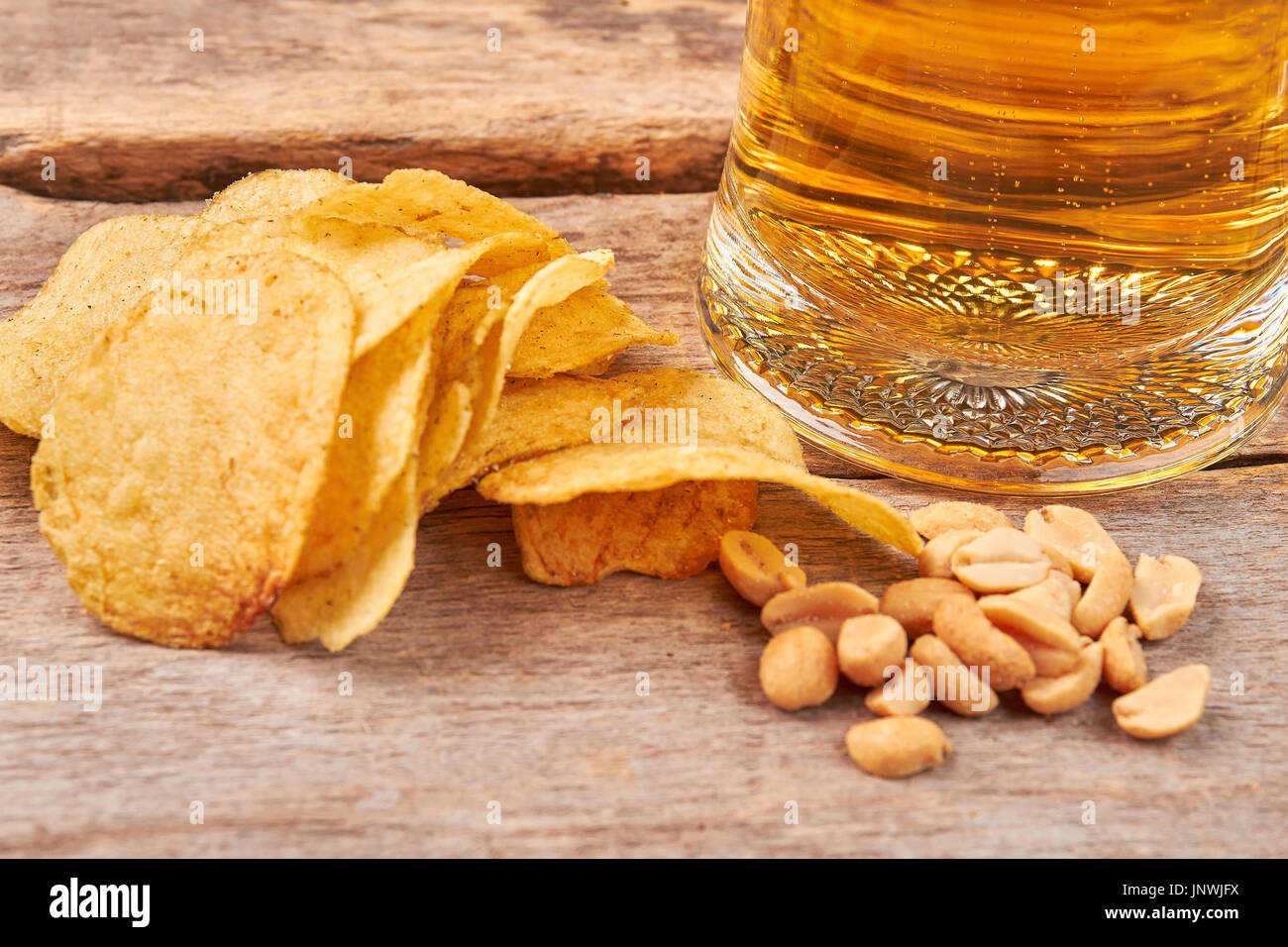 Potato chips peanuts snack hi-res stock photography and images - Alamy