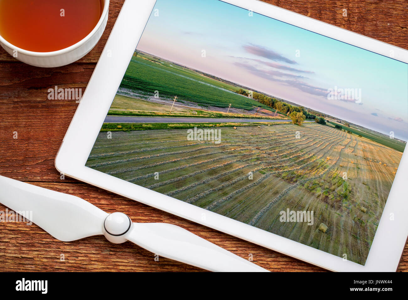 aerial view of rural Nebraska landscape with a narrow road, meadow and ...