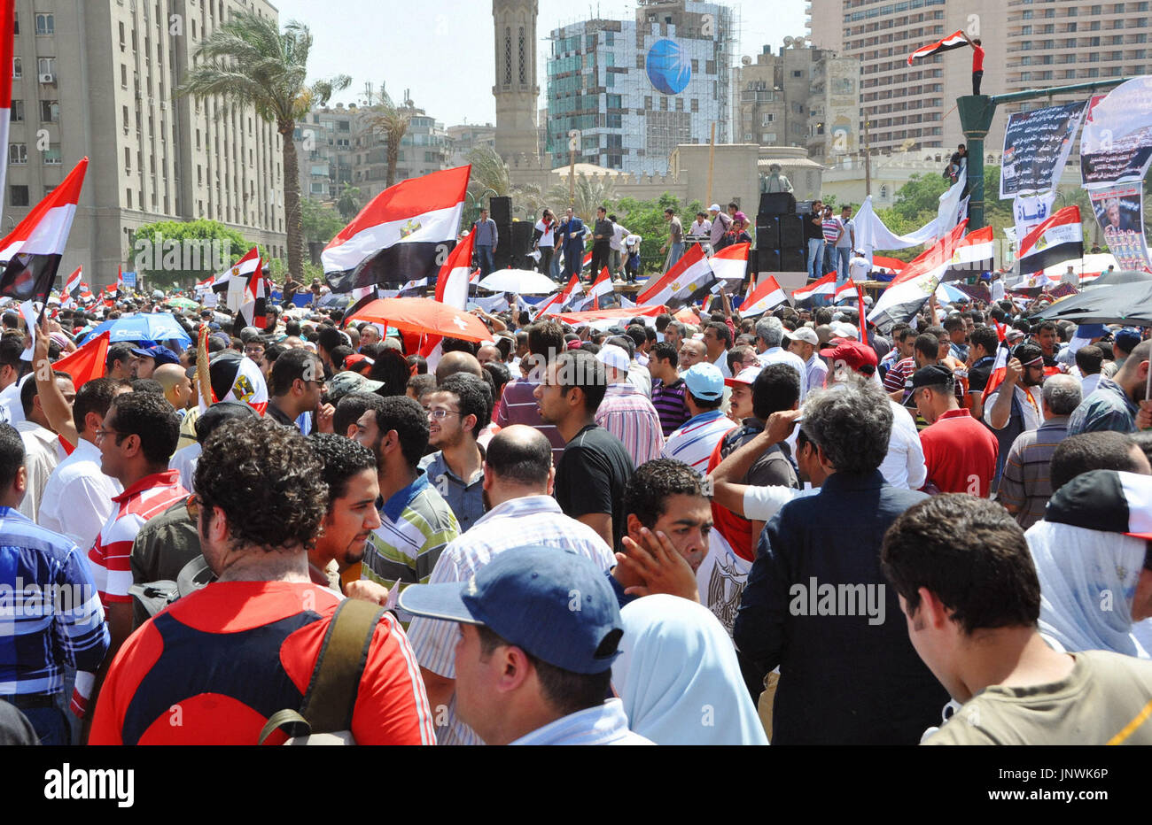 CAIRO, Egypt - People gather to take part in a demonstration at Tahrir ...