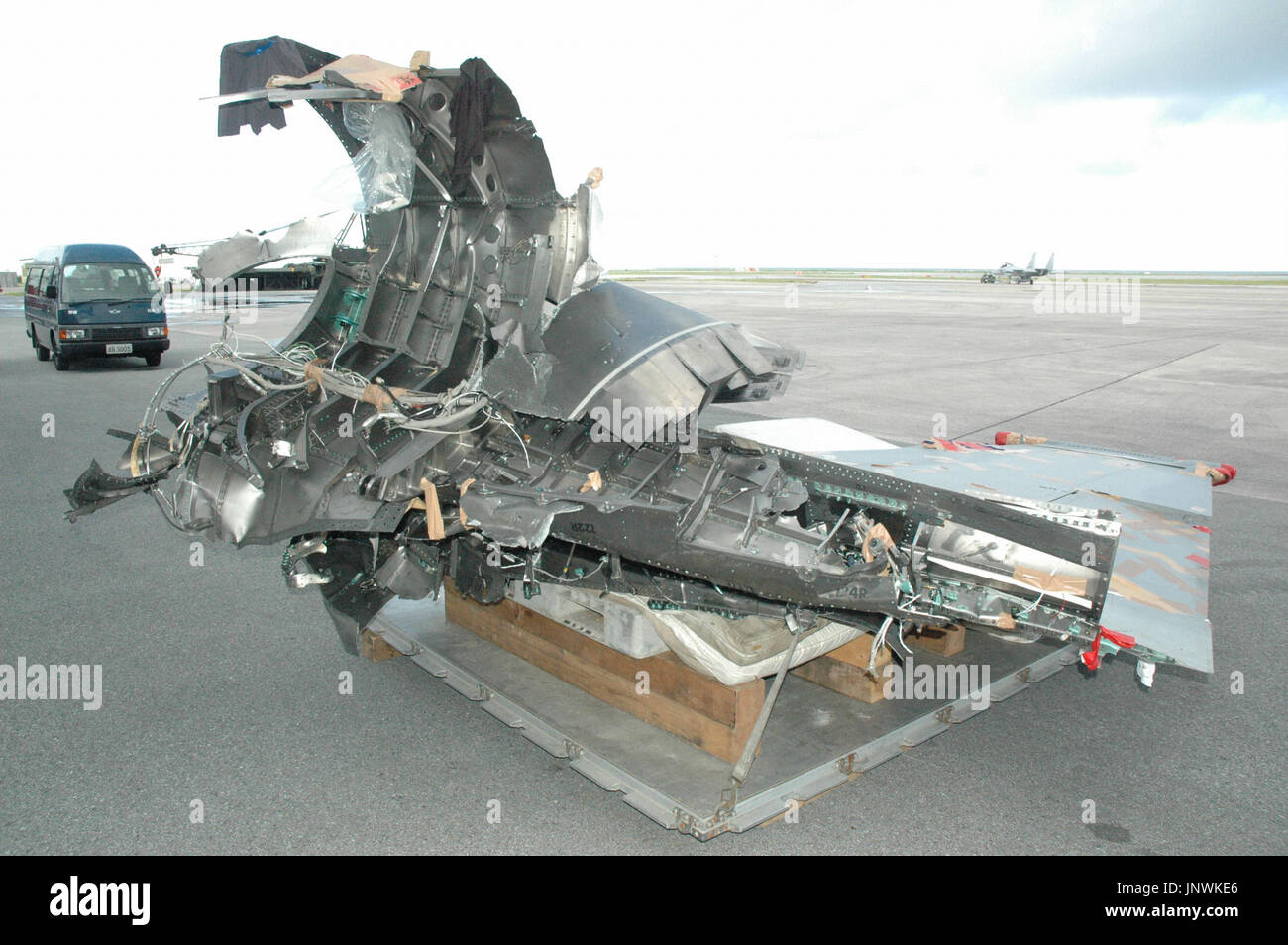 NAHA, Japan - The vertical tail fin of an F-15 fighter retrieved from ...