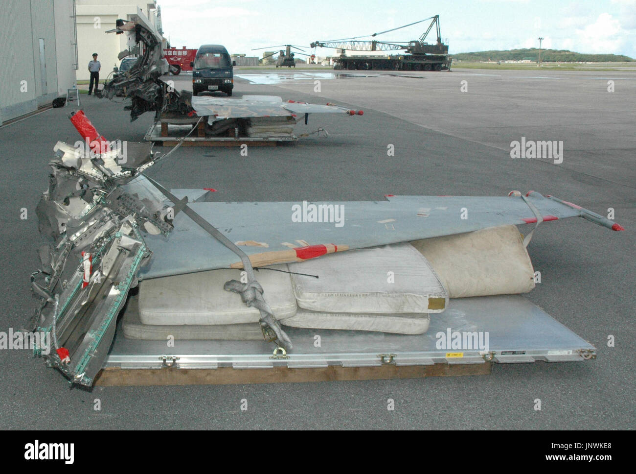 NAHA, Japan - The vertical tail fin of an F-15 fighter retrieved from ...