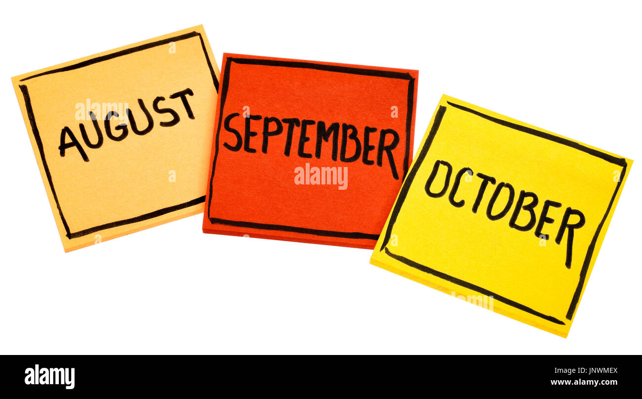 August, September and October - handwriting in black ink on an isolated ...