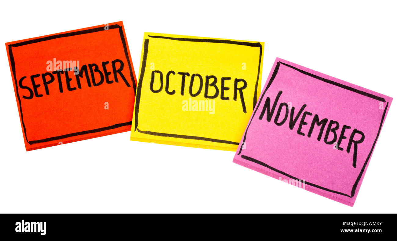 September, October and November - handwriting in black ink on isolated ...