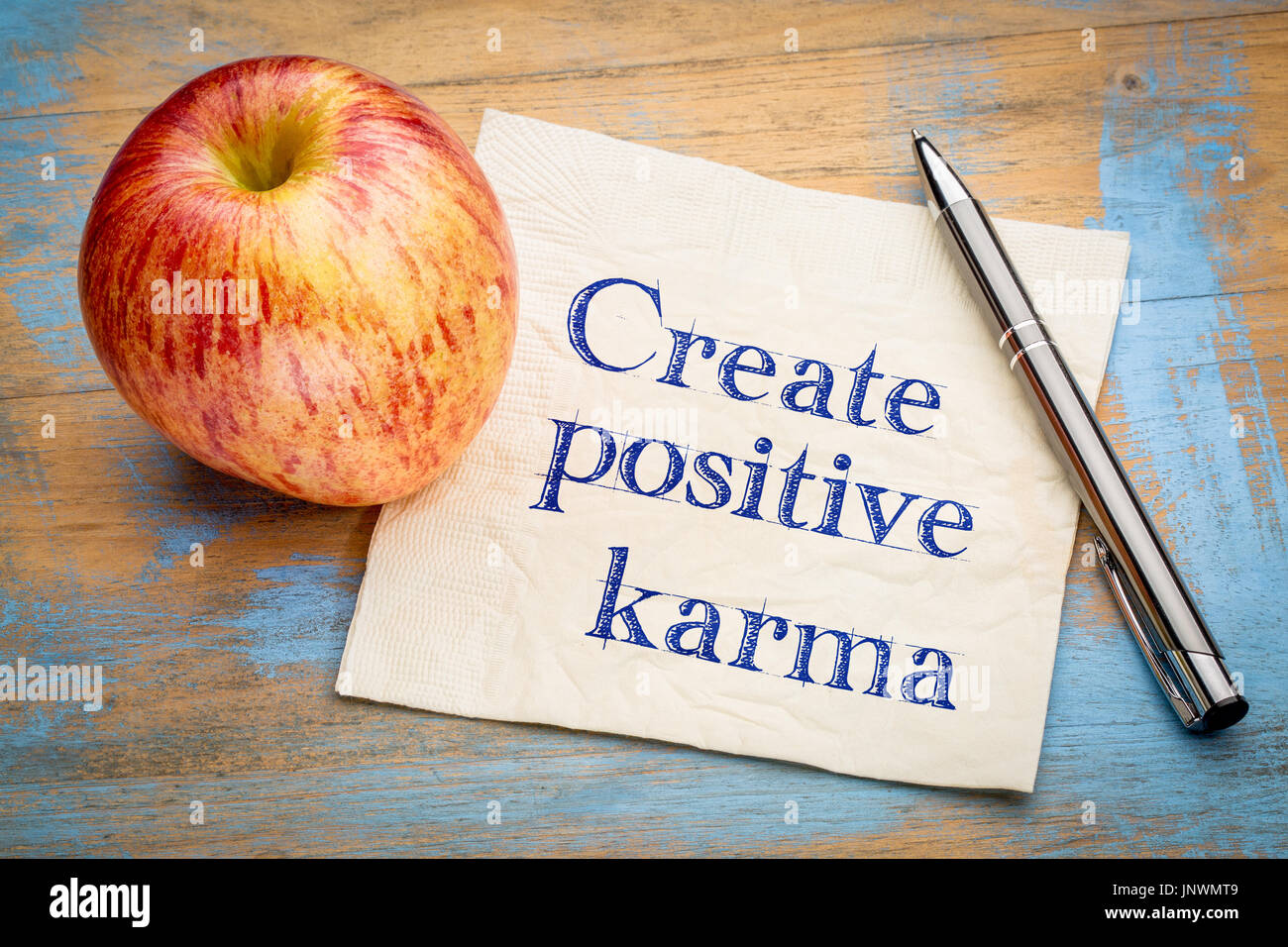 create positive karma - motivational handwriting on a napkin with apple ... create positive karma - motivational handwriting on a napkin with apple ...