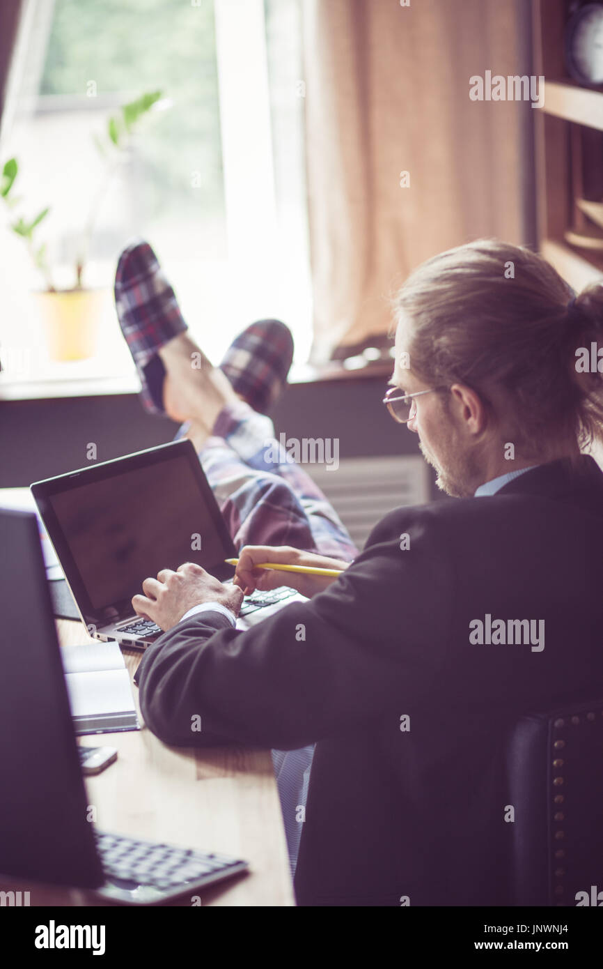 Male on computer rear view hi-res stock photography and images - Alamy