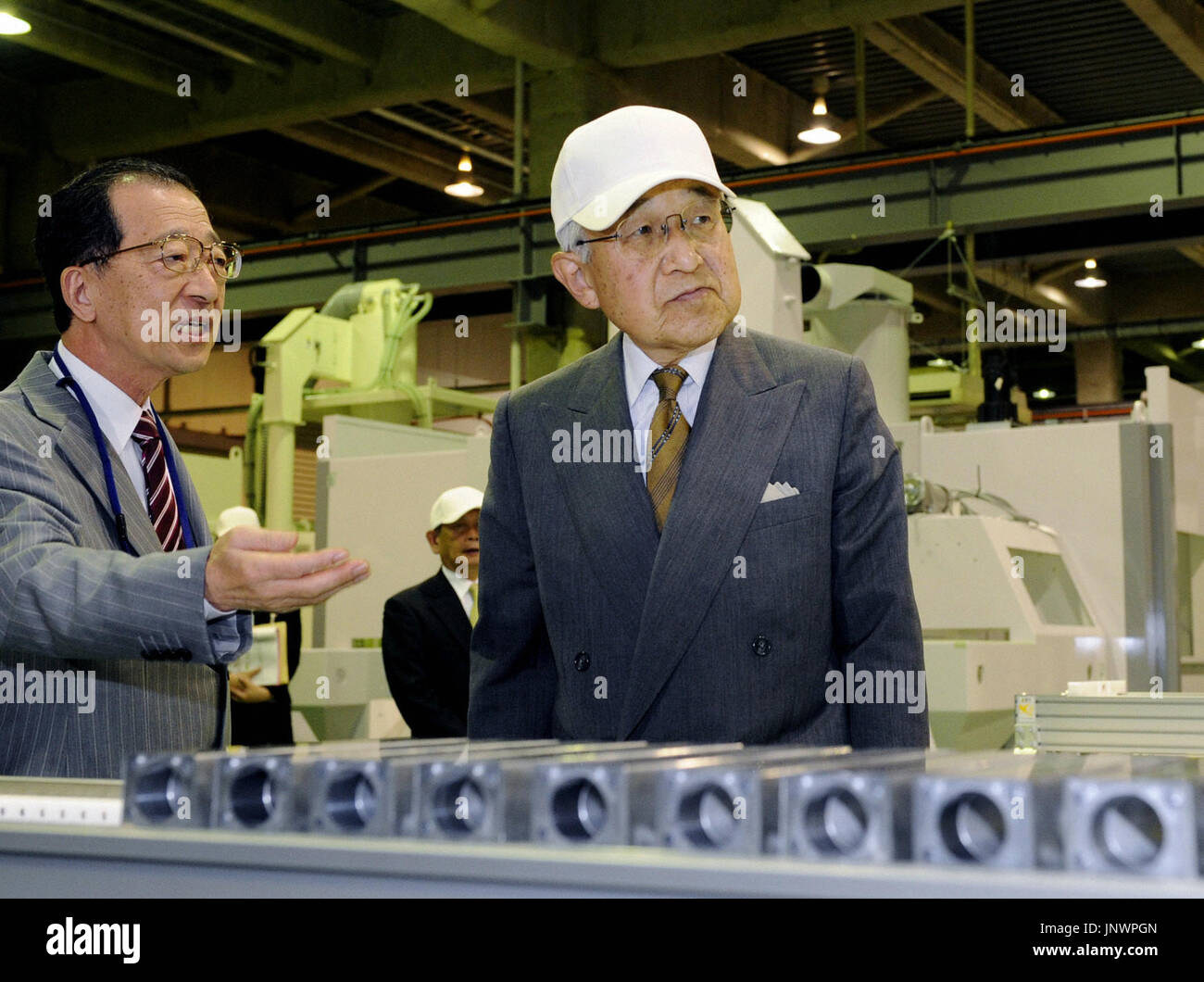 TOKYO, Japan - Japanese Emperor Akihito (R) visits Fuji Manufacturing ...