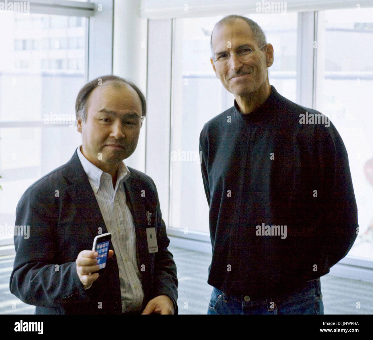 TOKYO, Japan - File photo taken in June 2008 shows Steve Jobs (R ...