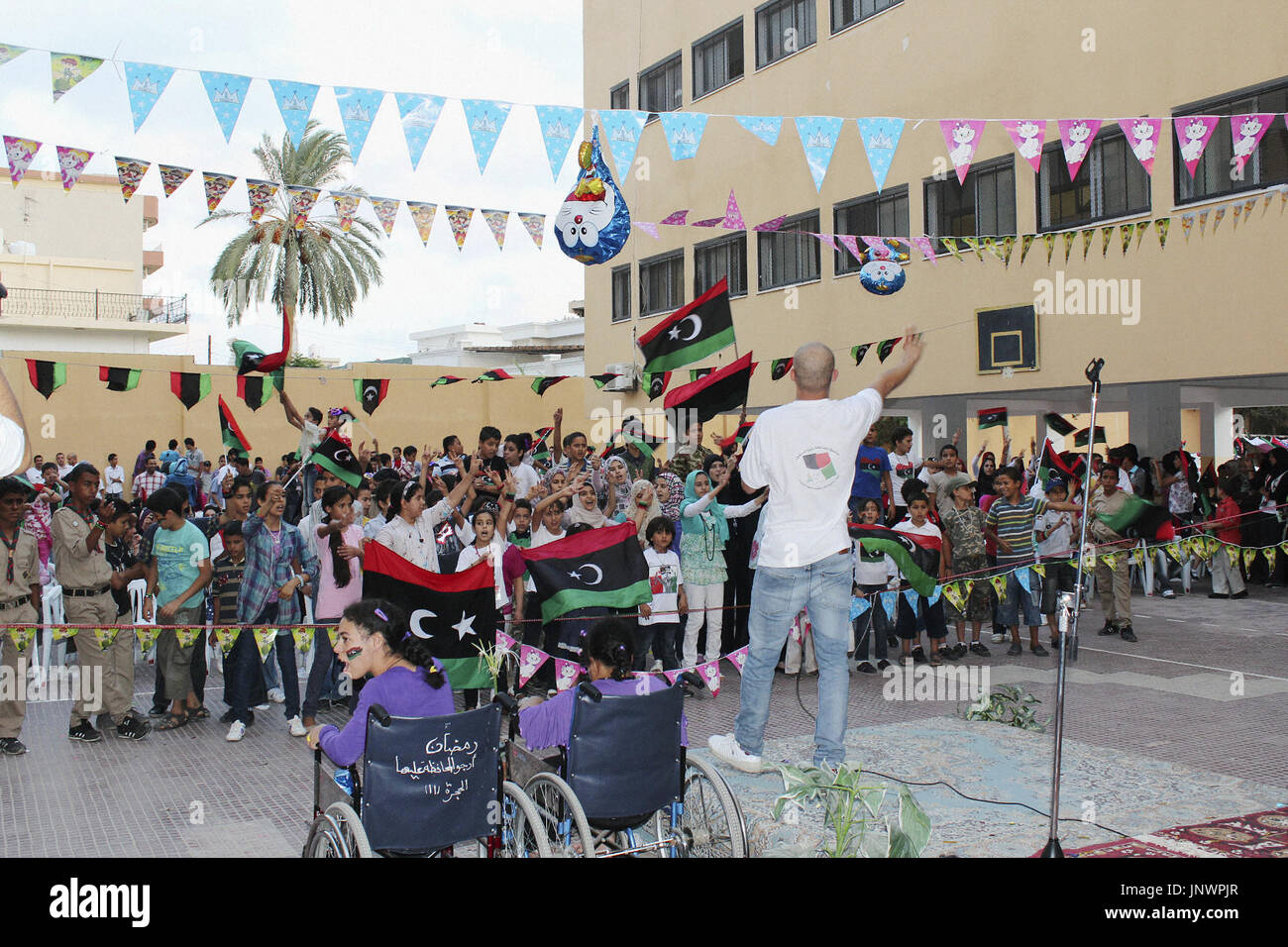 TRIPOLI, Libya - Children sing during a charity event at an elementary ...