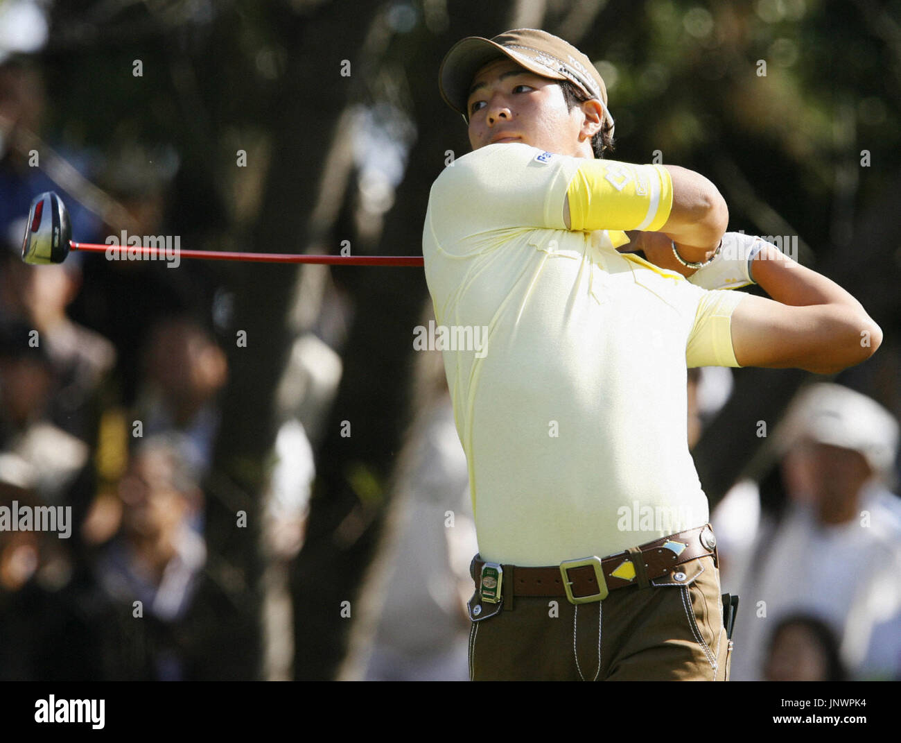 YOKOHAMA, Japan - Japanese golfer Ryo Ishikawa launches a shot during ...