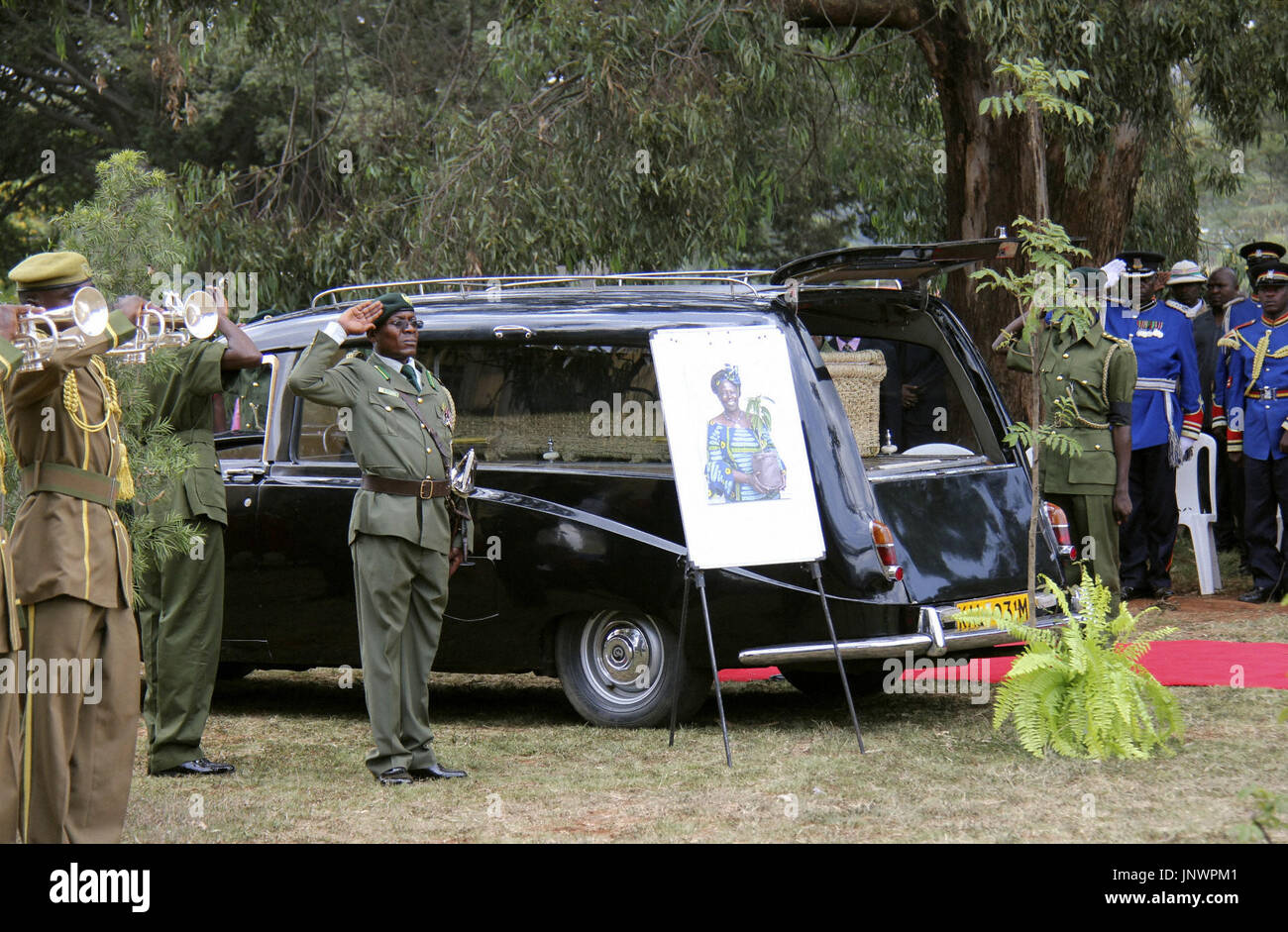 NAIROBI, Kenya - A car carrying the coffin of the late Kenyan ...