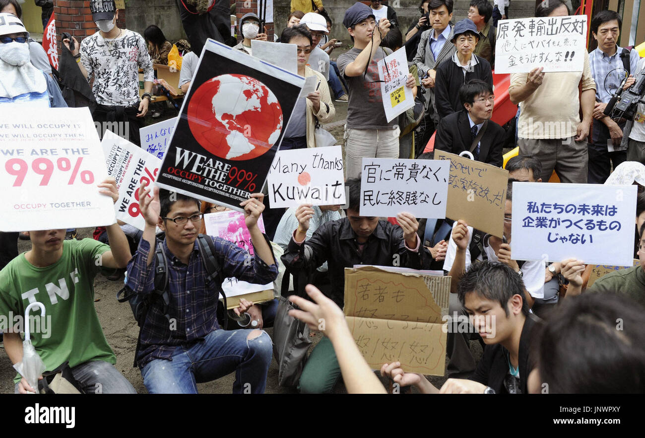 TOKYO, Japan - People take to the streets in Tokyo to protest against ...
