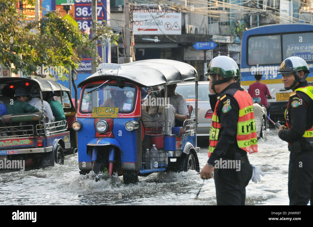 BANGKOK, Thailand - A street in central Bangkok is inundated on Oct. 24 ...