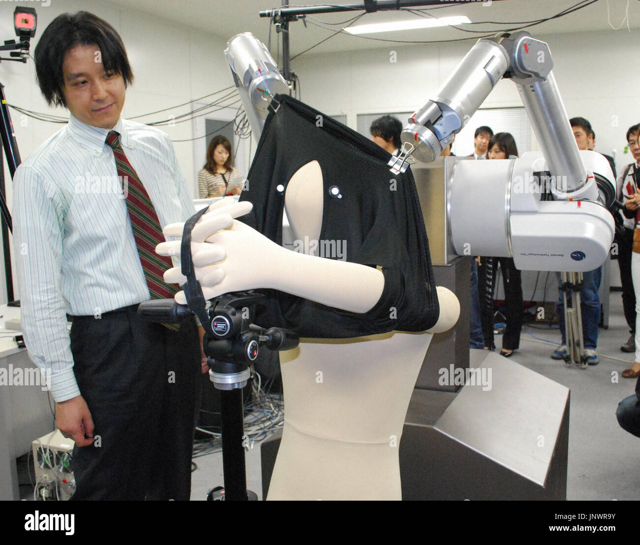 NARA, Japan - Tomohiro Shibata (L), associate professor at the Nara ...